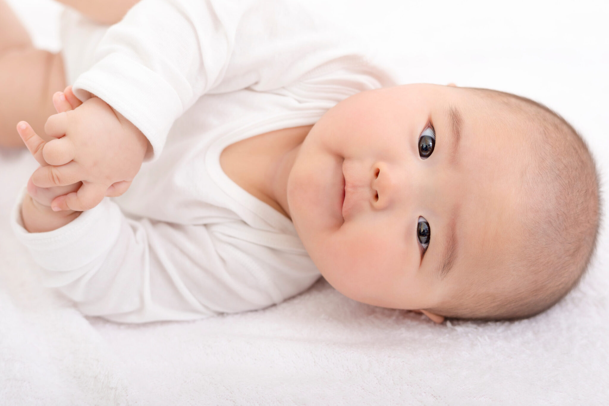 Helping Your Baby to Roll Over - Connect the Dots Pediatric Therapy